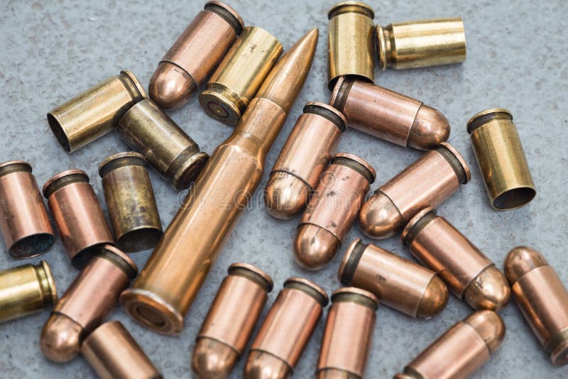 Cartridges and Scales from Various Types of Weapons Stock Photo - Image ...