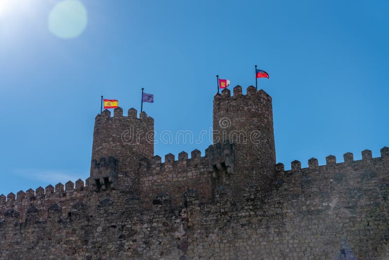 View of Castle External Wall with Two Towers and Multiple Flags Stock ...