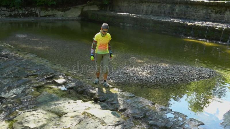 View of Caucasian Male Passing Green River Stock Video - Video of ...