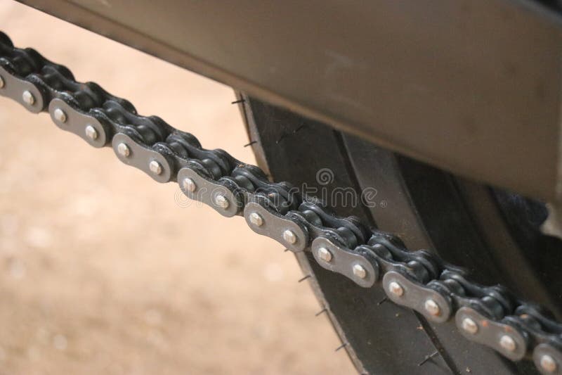 View of a Chain from Motorcycle. Chains that Drive the Wheels are ...