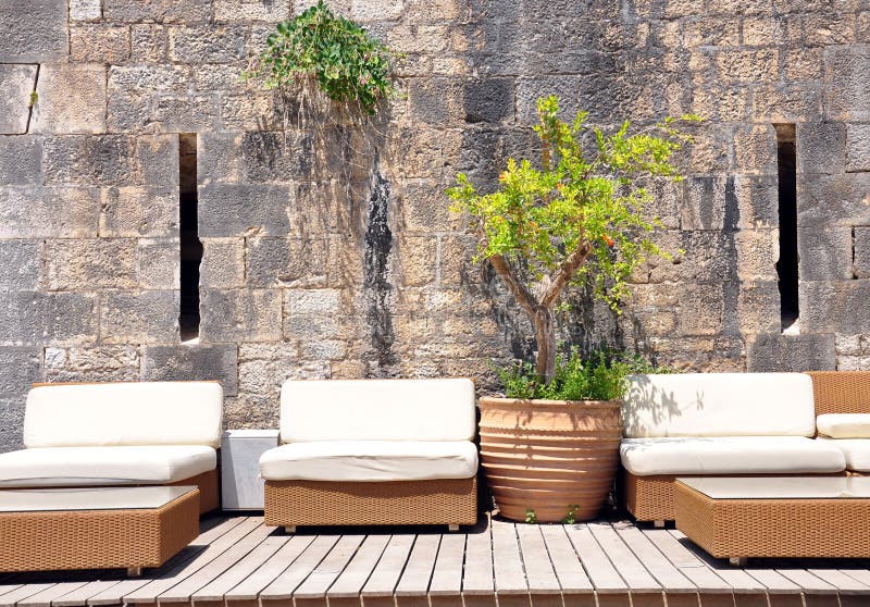 View on a Chair by the Stone Wall Stock Image - Image of architecture ...