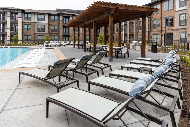 View on the Chaise Lounge Chairs, Swimming Pool and Rooftop Dining Area ...