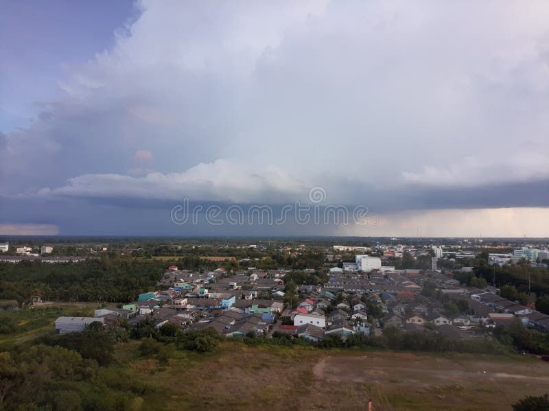 View of a City Landscape and Far Away Raining Cloud Stock Photo - Image ...