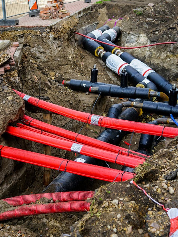Underground Heating System Pipes Replacement on the City Street Stock ...