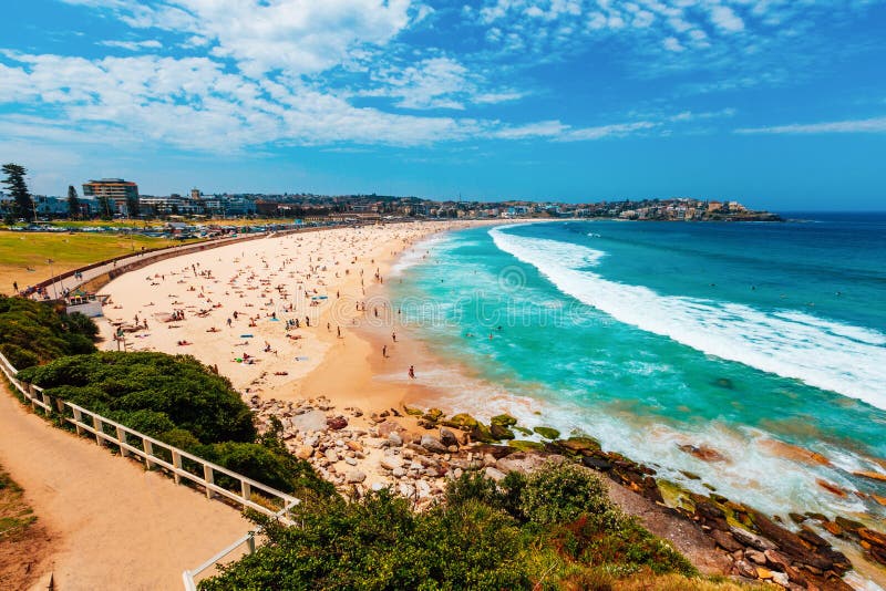 View of the Clean Wavy Beach with Rocky Coast Captured on a Sunny Day ...