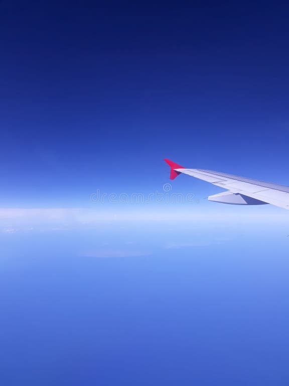 The View of the Clear Blue Sky from Inside the Airplain. Stock Photo ...