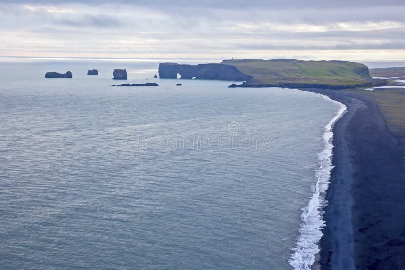 View of the Cliffs of Dyrholaey in Iceland Stock Photo - Image of ...