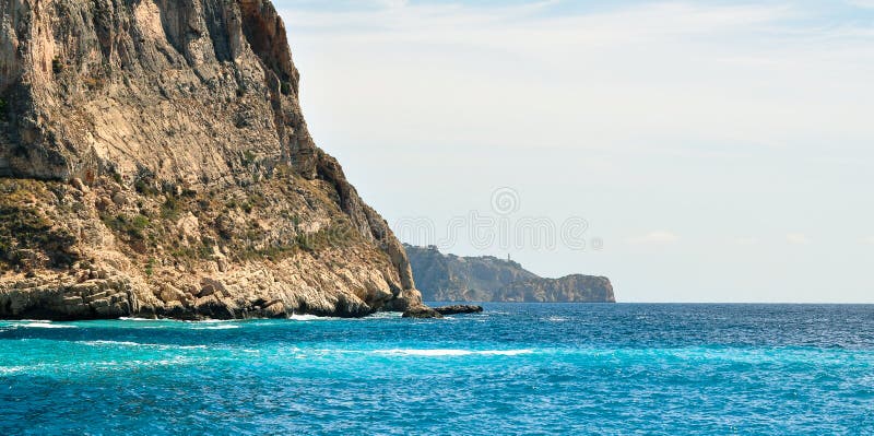 View of cliffs on the sea stock photo. Image of vacation - 189227342