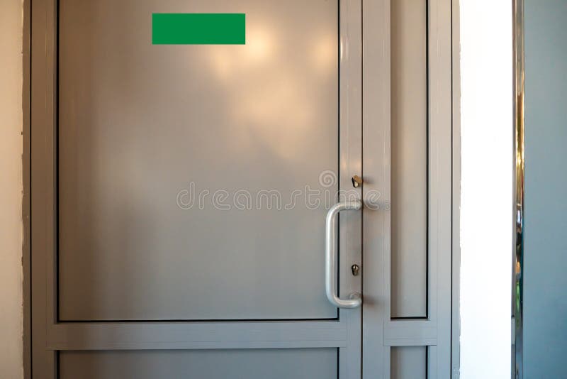 View of the Closed Door of the Evacuation Exit from the Building during ...