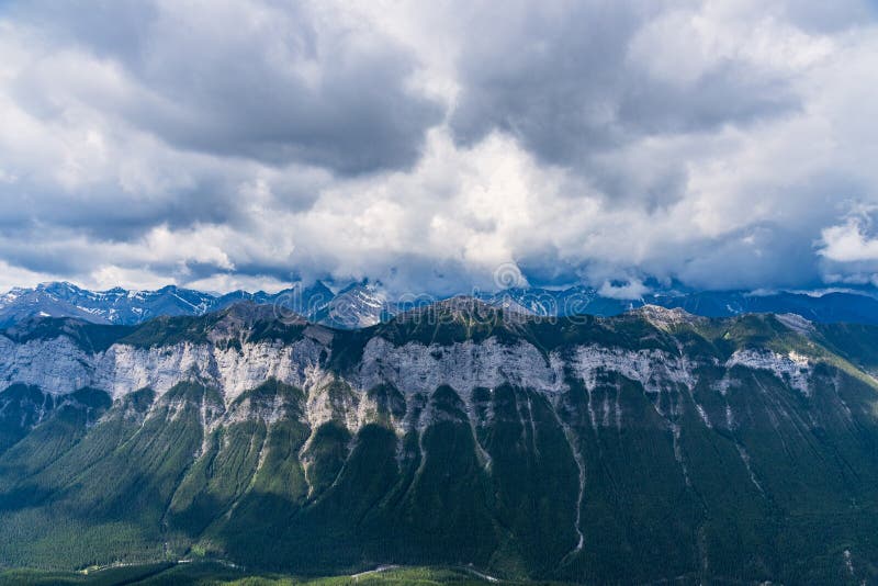 View of Clouds Blanketing Rocky Mountains from Mt Rundle Stock Image ...