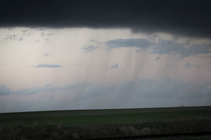 View of Clouds with Rain Pouring in the Distance Stock Photo - Image of ...