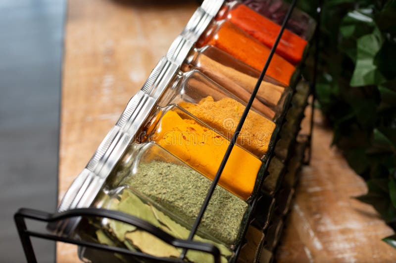 Rainbow color spice rack stock image. Image of culinary - 276723271