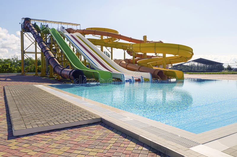 View of Two Slides in a Public Park, Background Grass and Trees Stock ...