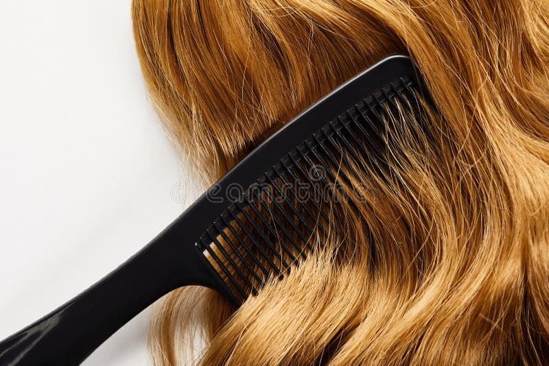 View of comb on brown hair stock photo. Image of styling - 181716150