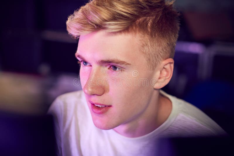 View between Computer Screens of Teenage Boy Gaming at Home Stock Image ...