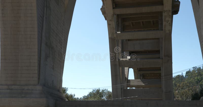 View of a Concrete Arch Bridge Spanning a Road from Underneath Stock ...