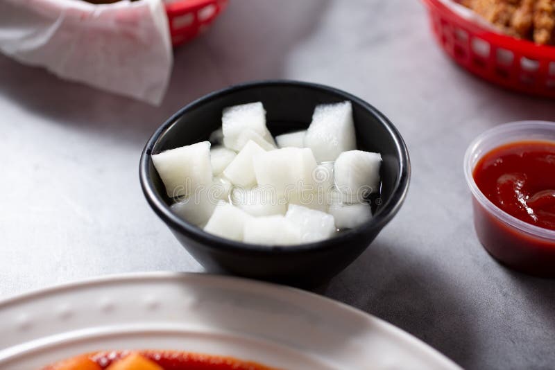 Pickled daikon radish cup stock photo. Image of product - 240159260