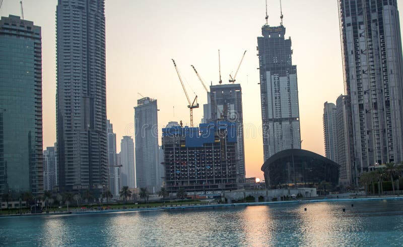 View of a Construction in Downtown Dubai and Dubai Opera during Sunset ...