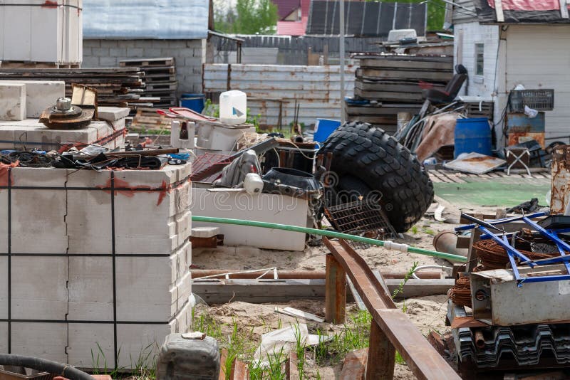 View of the Courtyard Cluttered with Belongings. a Mess in the Yard ...