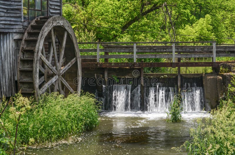 The Dam at the Old Mill stock image. Image of trees - 106614923
