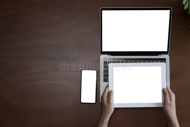 View on a Dark Table. Female Hands Using a Laptop, Smartphone and ...