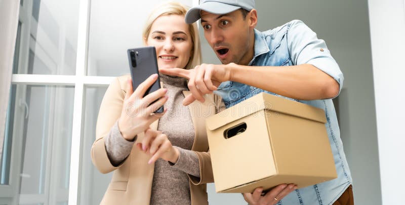 View of a Delivery Man Handing Over a Parcel To Customer Stock Image ...
