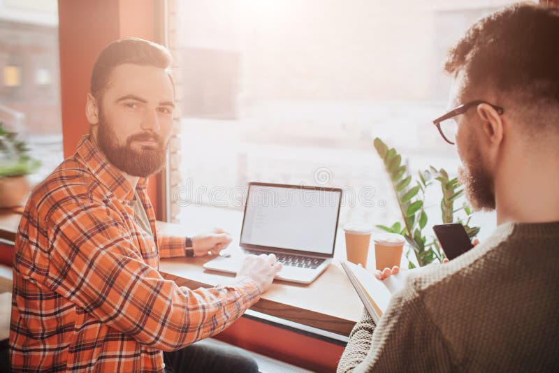 A View from a Different Angle Where on of Hipsters is Sitting and ...