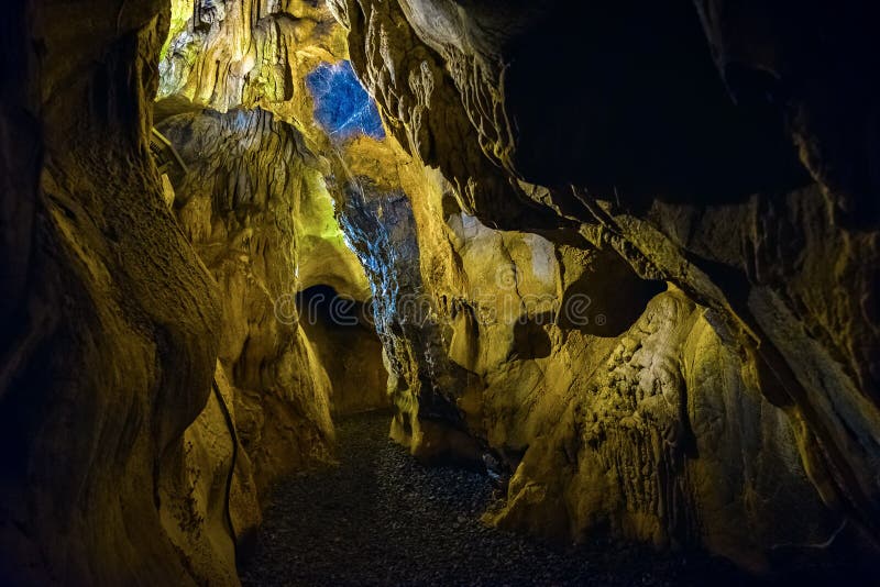 View of Dim Cave stock image. Image of rocky, light, calcite - 79758317