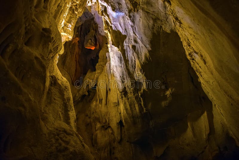 View of Dim Cave stock photo. Image of background, rock - 79760954