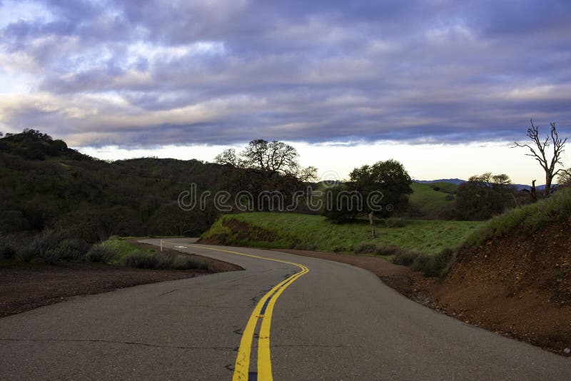 View Down the Center of a Road Stock Image - Image of mountains, center ...