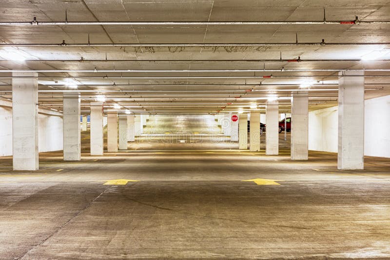 View Down the Length of an Empty Parking Garage Stock Image - Image of ...