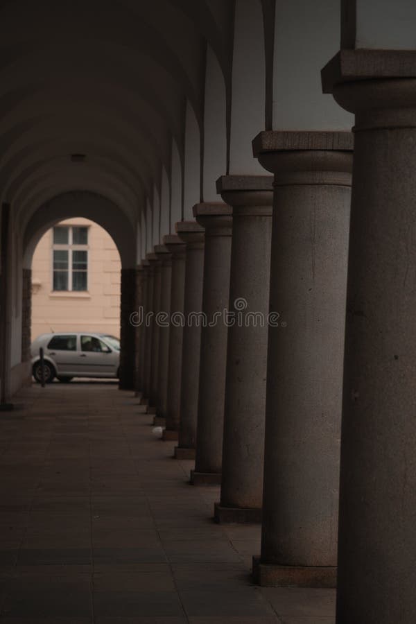 A View Down a Long Historical Arcade or Colonnade, Characterized by a ...