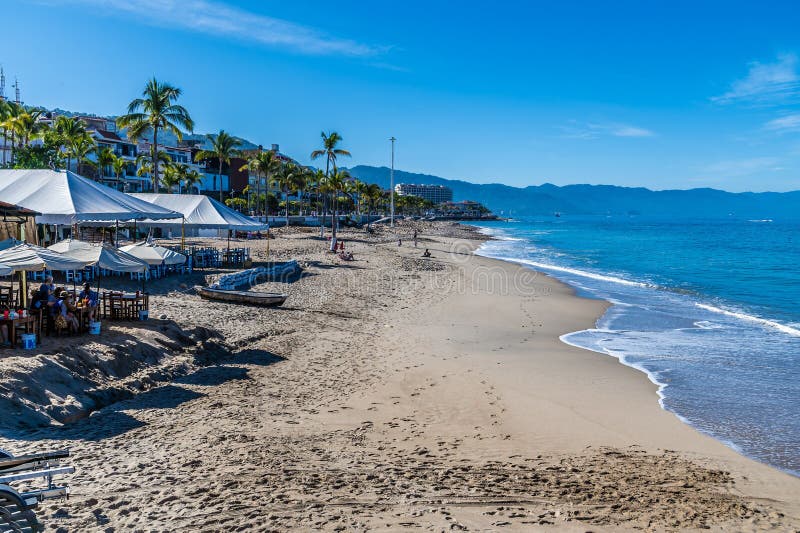 A View Down the Sandy Beach from the Malecon Promenade in Puerto ...