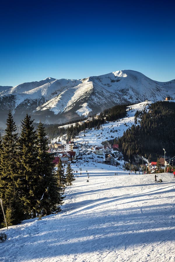 View Down of a Snowy Ski Slope in Alpine Mountain Valley Stock Photo ...