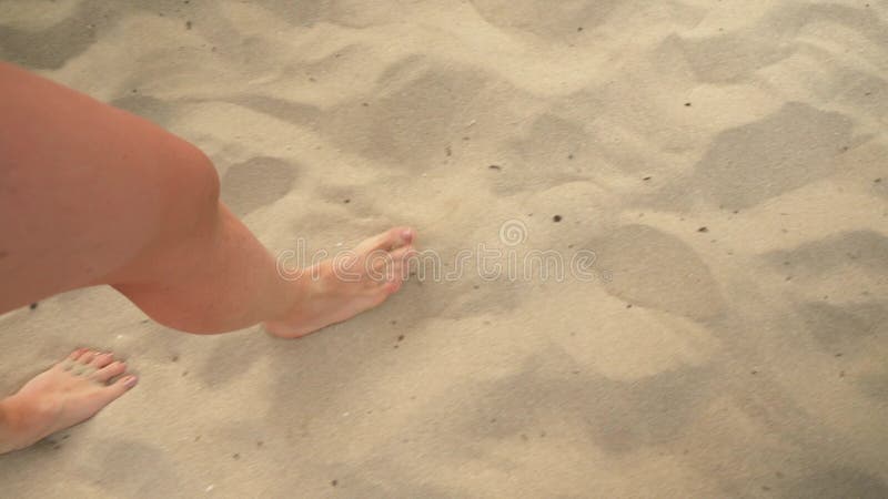 View Down To Woman Bare Feet Walking on Sandy Beach Stock Footage ...