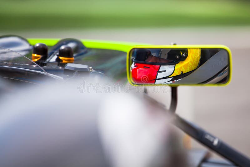 A View of a Driver in the Rearview Mirror Inside His Supercar and Ready ...