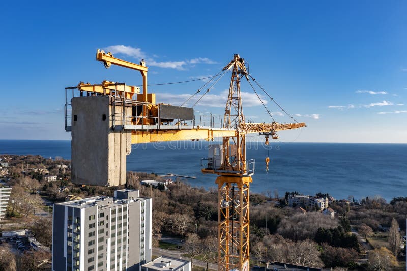 View from a Drone To Construction Tower Crane Against a Blue Sky Stock ...