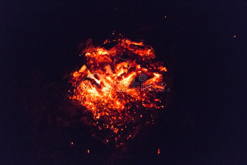 A Dying Bonfire Ready for Snuffing on Black Background Stock Photo ...