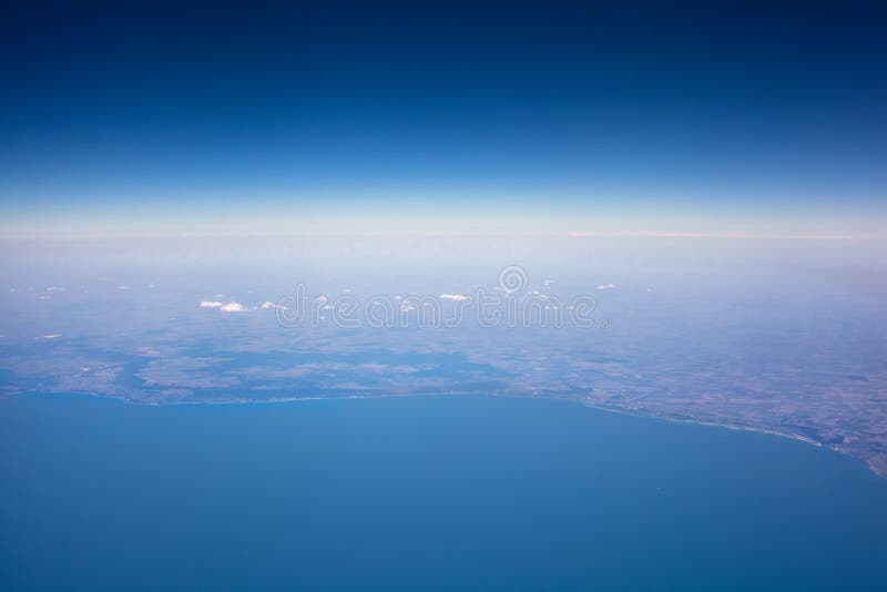 View of Earth from Plane, Blue Sky and the Sea Stock Image - Image of ...