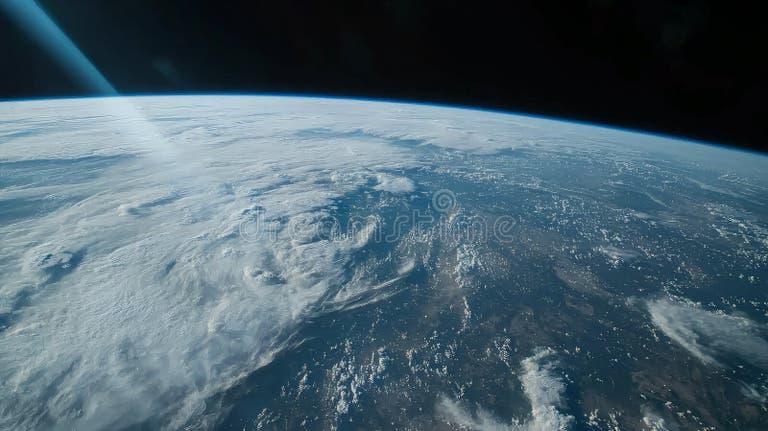 A View of Earth from Space, with a Beam of Sunlight Shining through the ...