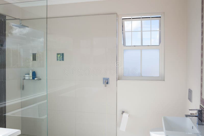View of an empty bathroom stock photo. Image of tile - 66161314