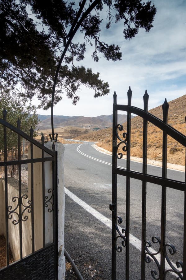 Mountain Road through Open Gate, Crete, Greece Stock Photo - Image of ...