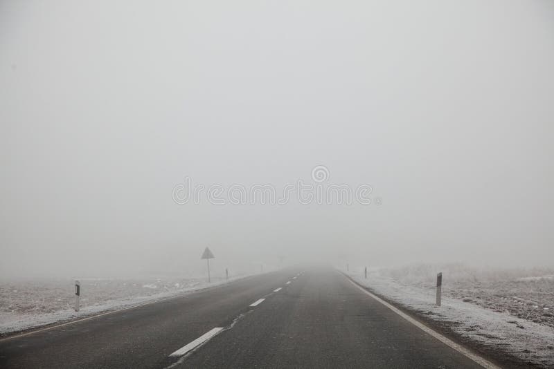 Empty road in cold winter stock image. Image of asphalt - 131607363