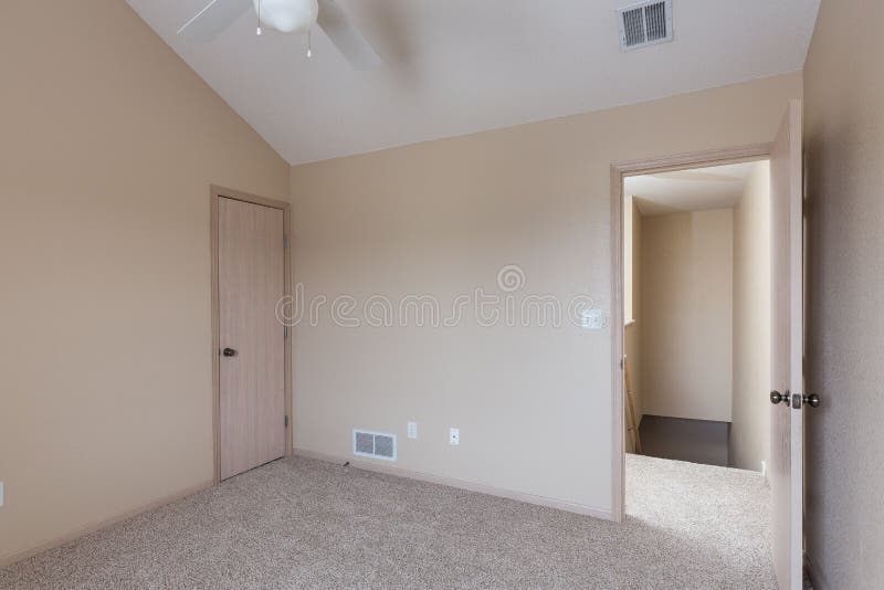 View of an Empty Room with a Carpeted Floor and an Open Door Editorial ...