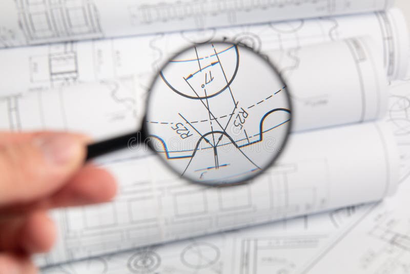 View of Engineering Drawings through a Magnifying Glass Stock Photo ...
