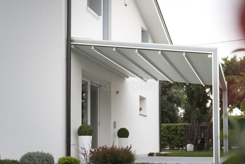 Entrance of a Luxury House with a Patio and Beautiful Landscaping on a ...