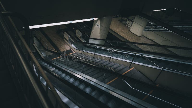 View of the Escalators from the Walkway at the Subway Station in ...