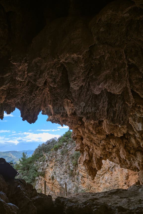 View of the Exit from the Cave in the Mountains Stock Photo - Image of ...