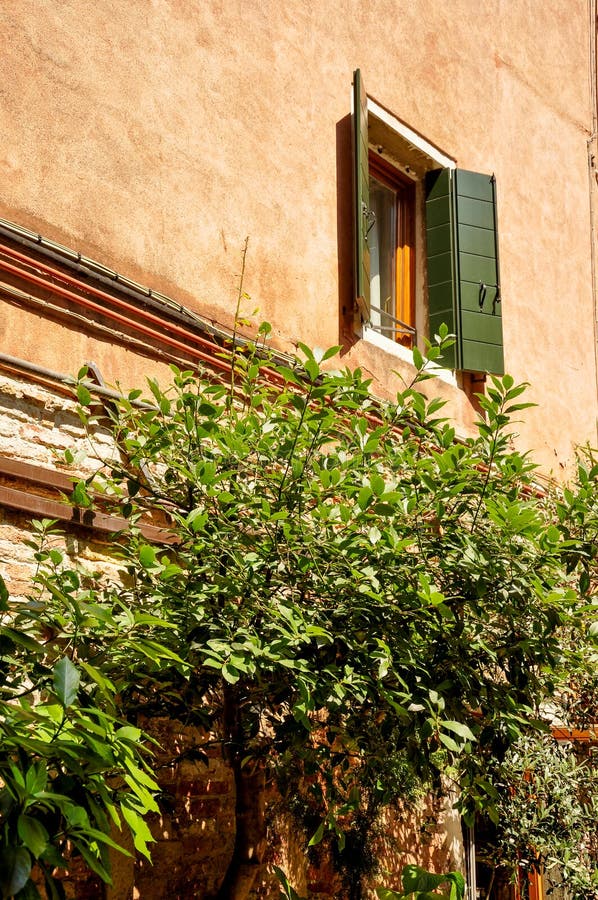 View of the Facade of the Wall of an Old House and a Window Stock Image ...