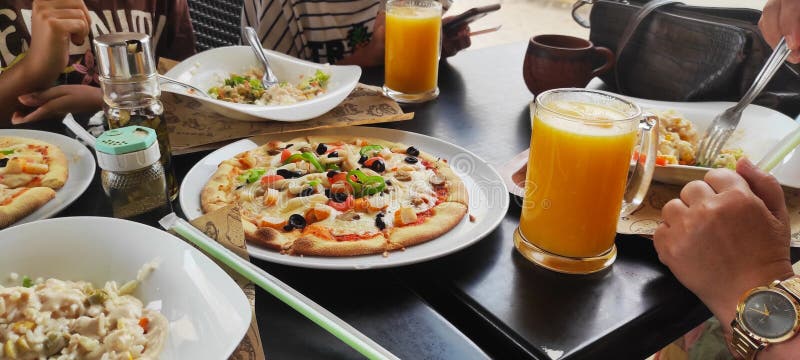 View of a Family Having Lunch on the Terrace of a Restaurant Stock ...